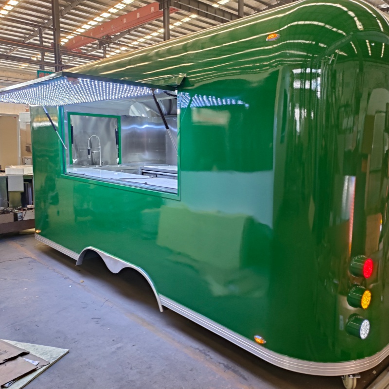 Customized bright green mobile food truck with built-in kitchen ...