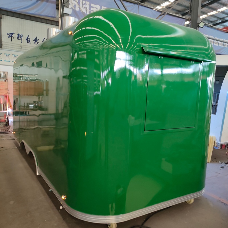 Customized bright green mobile food truck with built-in kitchen ...